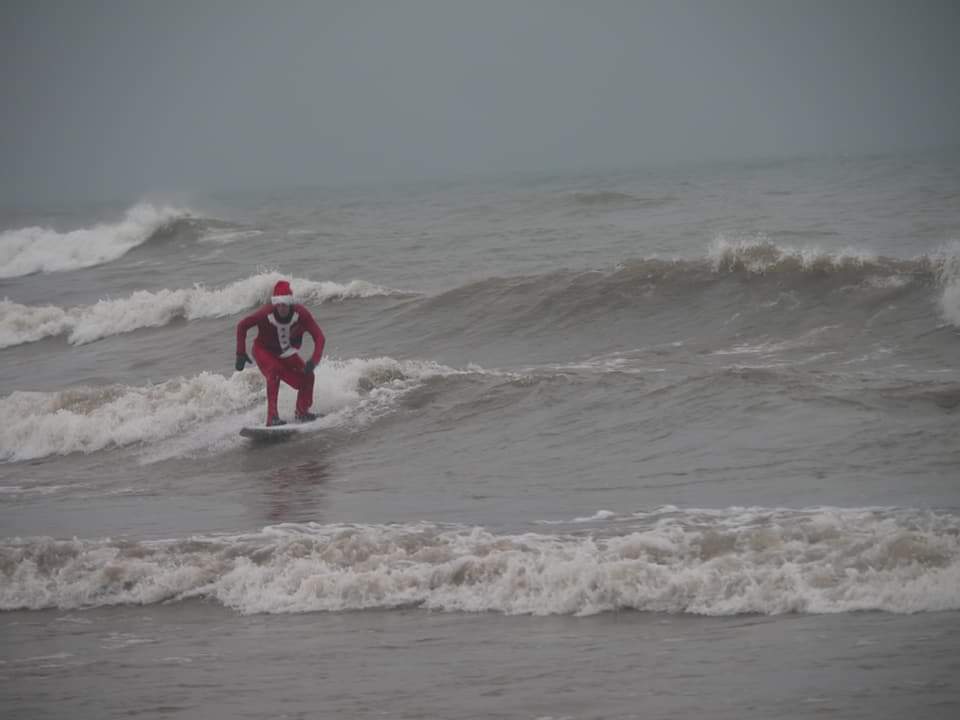 Cold as Ice: A Surfing Santa and Polar Bear Dips Keep Michiganders Frosty